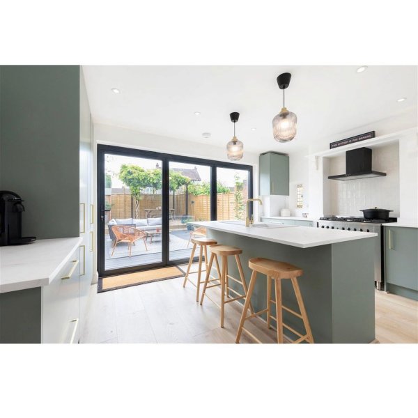 Greenwich Reed Green Handleless Kitchen | Kitchens | Howdens