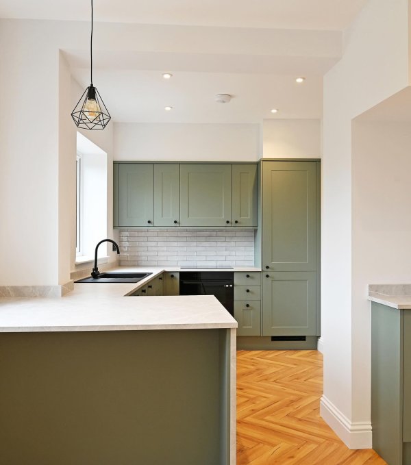 Chelford Reed Green Handleless Kitchen | Kitchens | Howdens