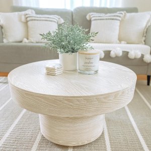 Volume round pedestal coffee table store