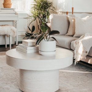Volume round pedestal coffee table store